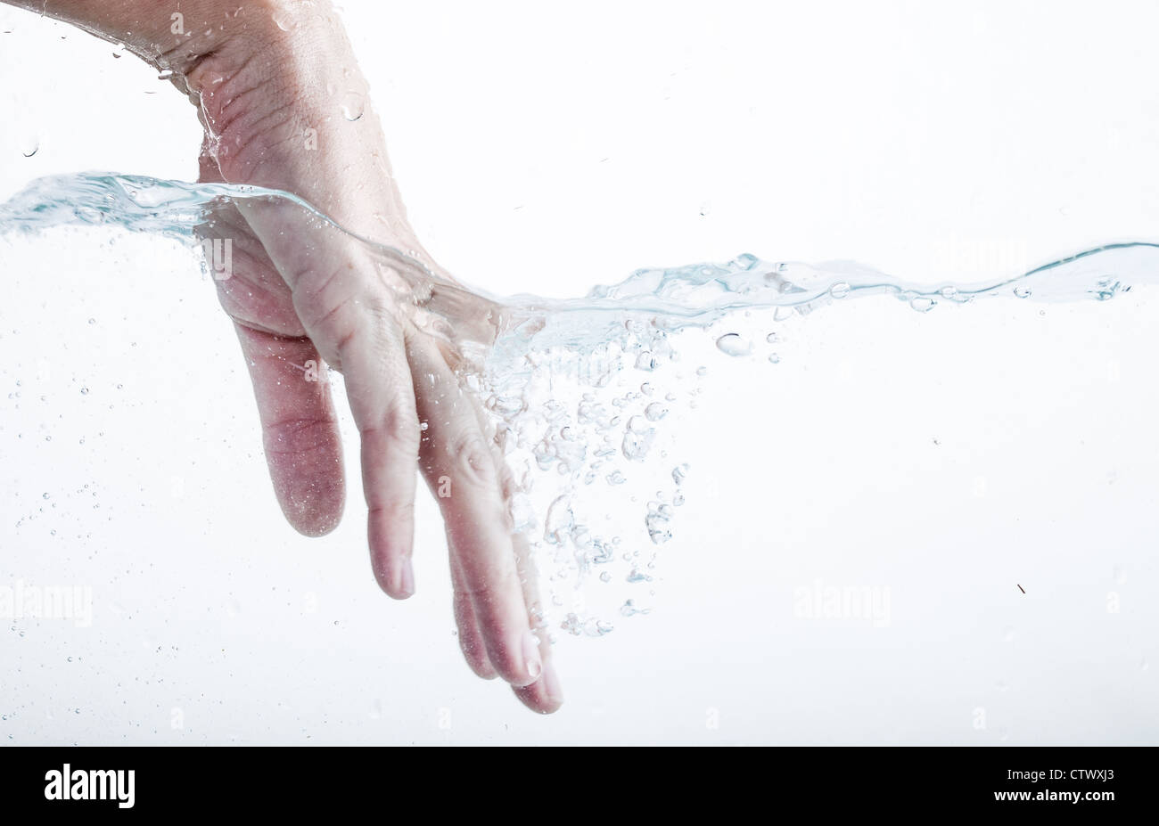 Hand in water Stock Photo - Alamy
