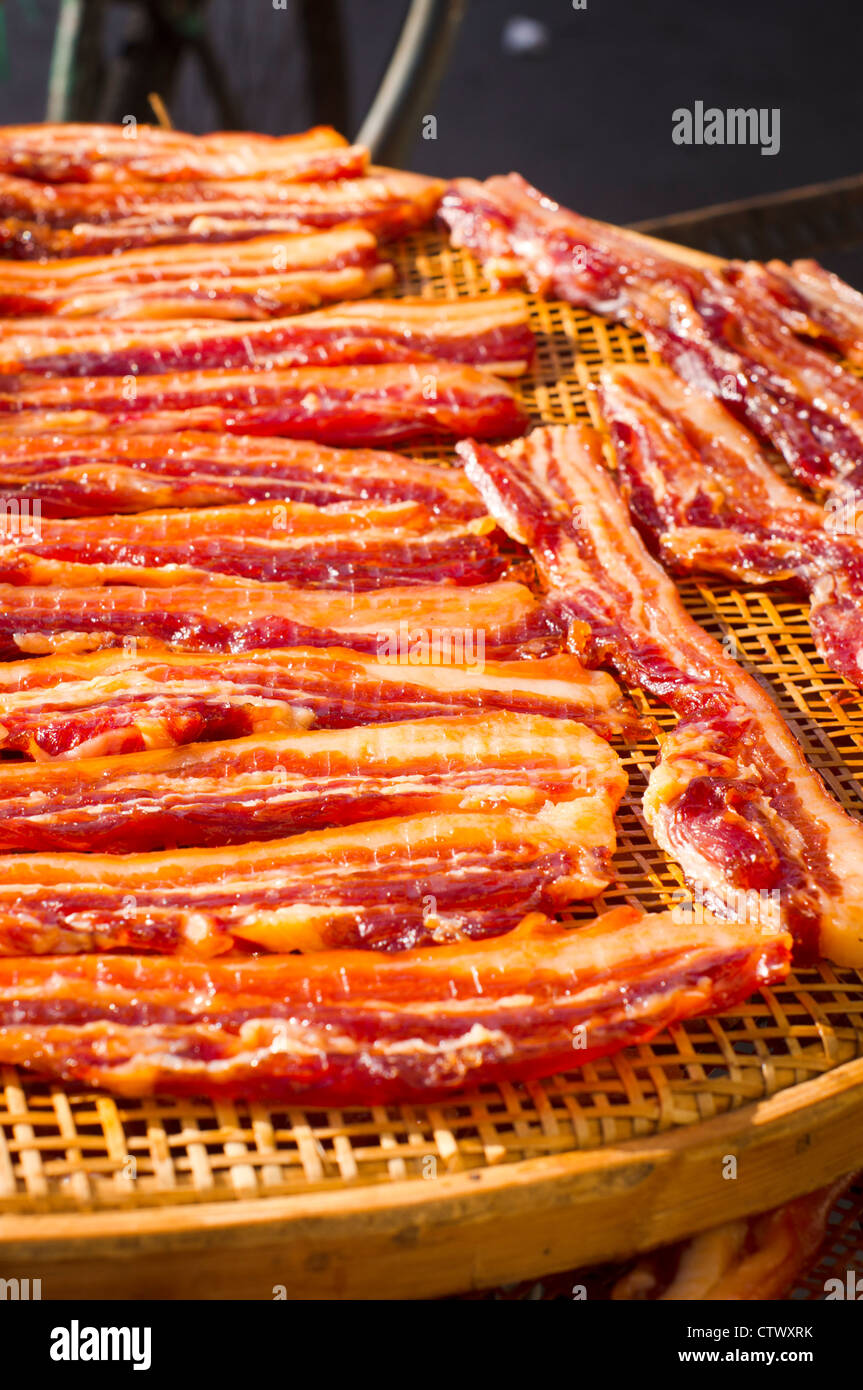 chinese dried meat in food curing process, photo is taken at Penang ...