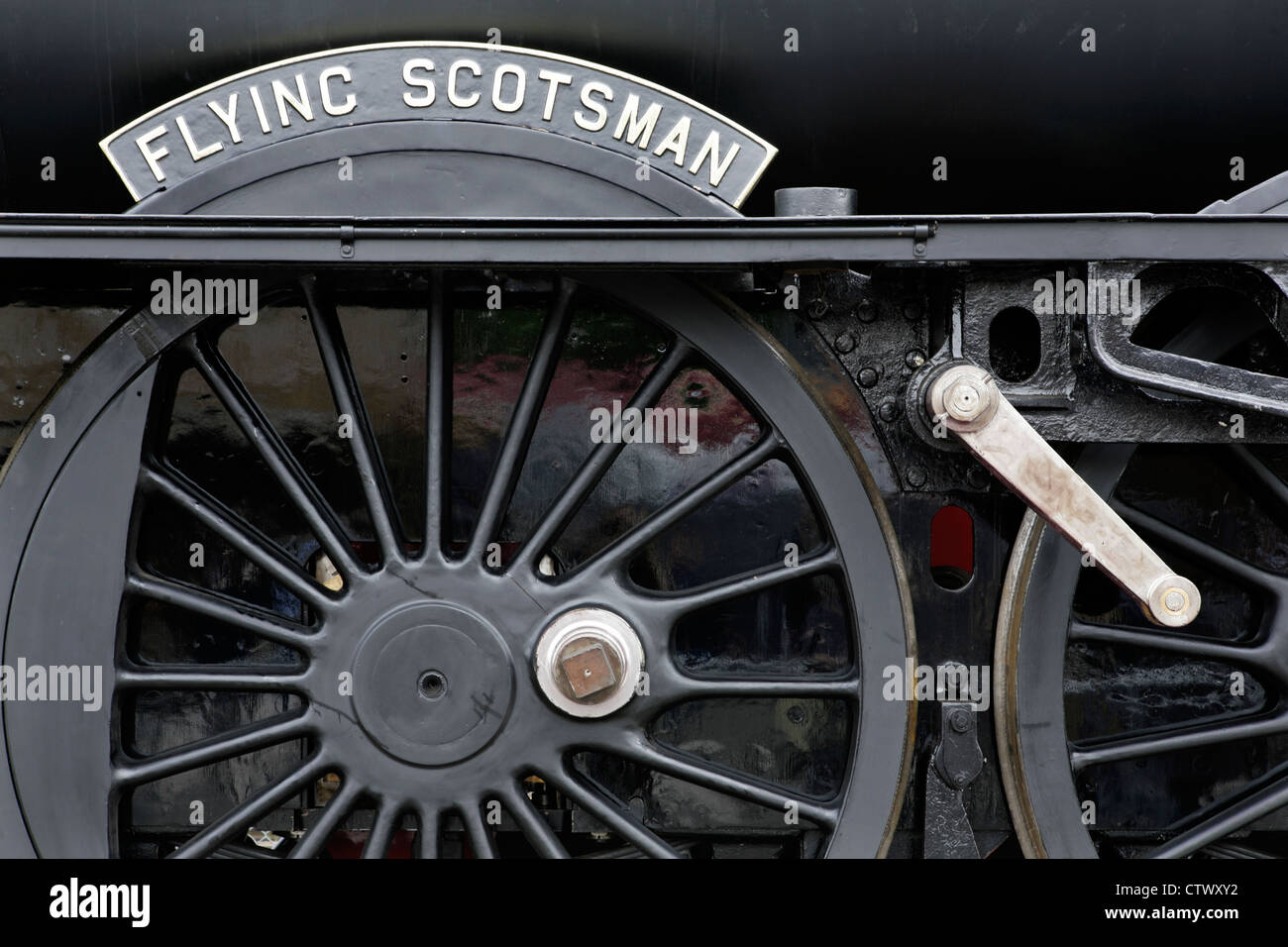 Nameplate and driving wheels of LNER steam locomotive Flying Scotsman during restoration Stock ...