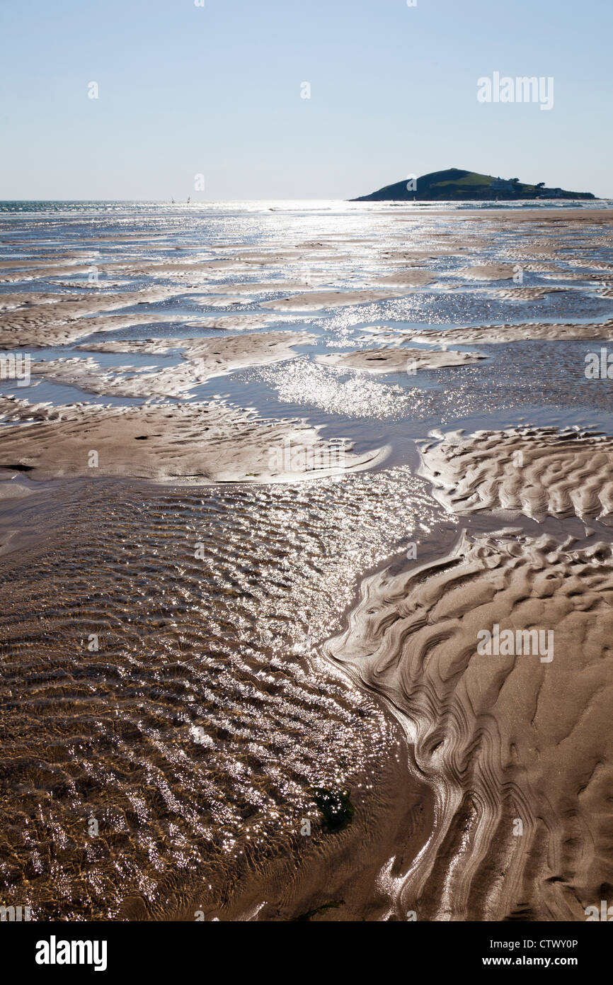 Sand patterns and the incoming tide at Bantham, Devon Stock Photo - Alamy