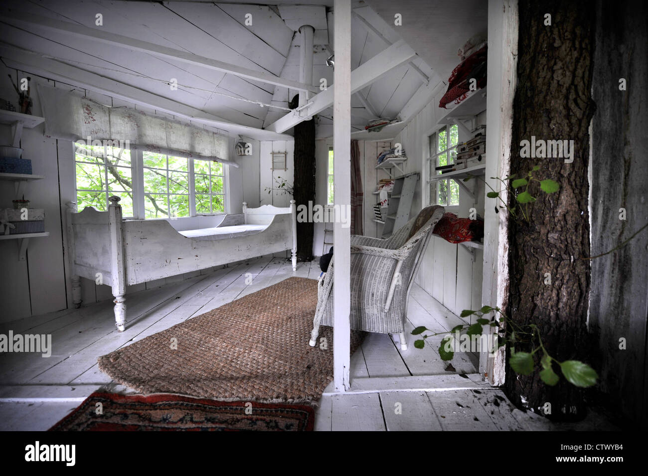 Treehouse interior trunk hi-res stock photography and images - Alamy