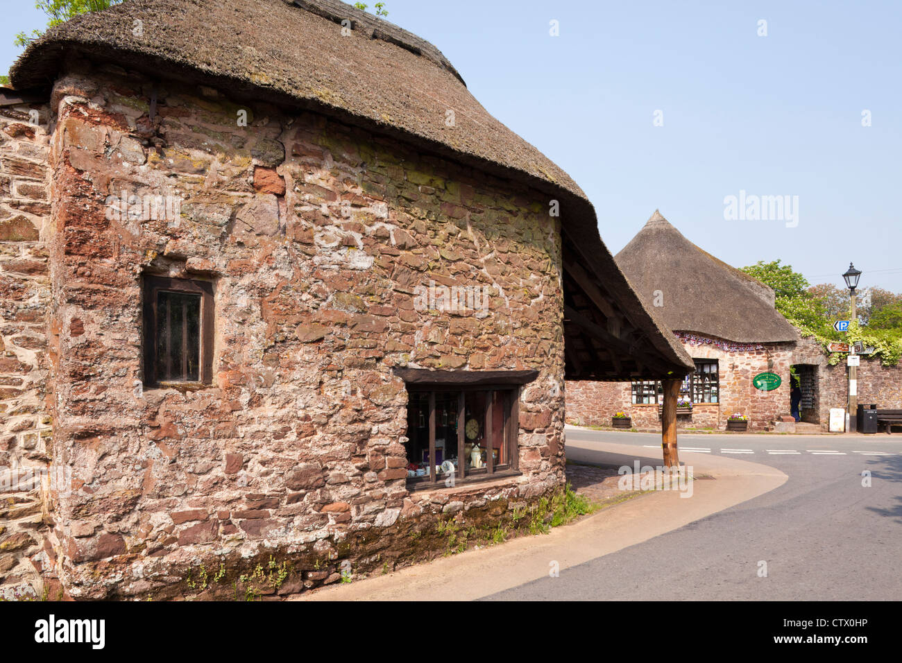 The famous thatched Cockington Forge dating from the 14th century in ...