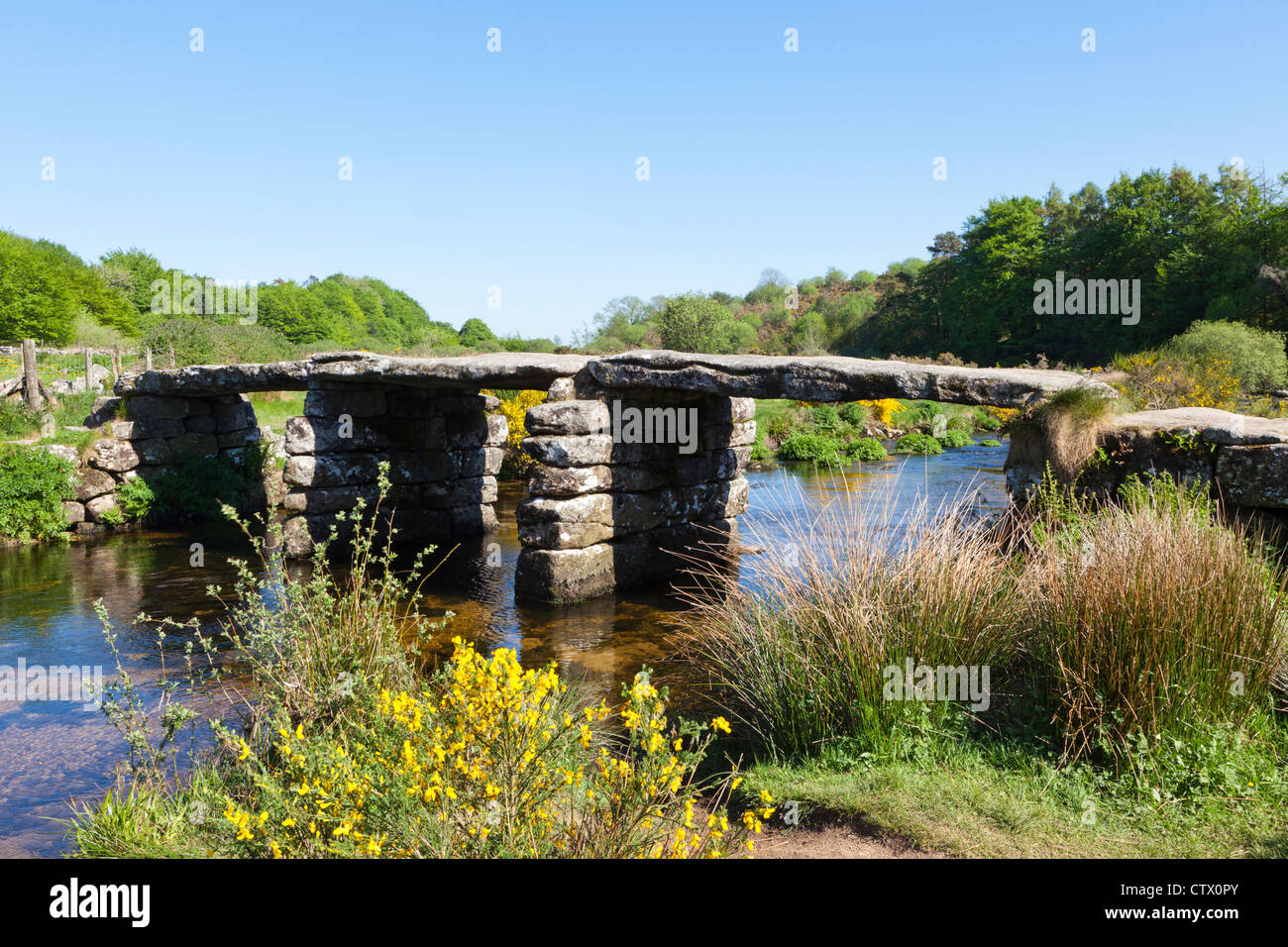 The famous clapper bridge (first recorded in 1380) on Dartmoor at ...