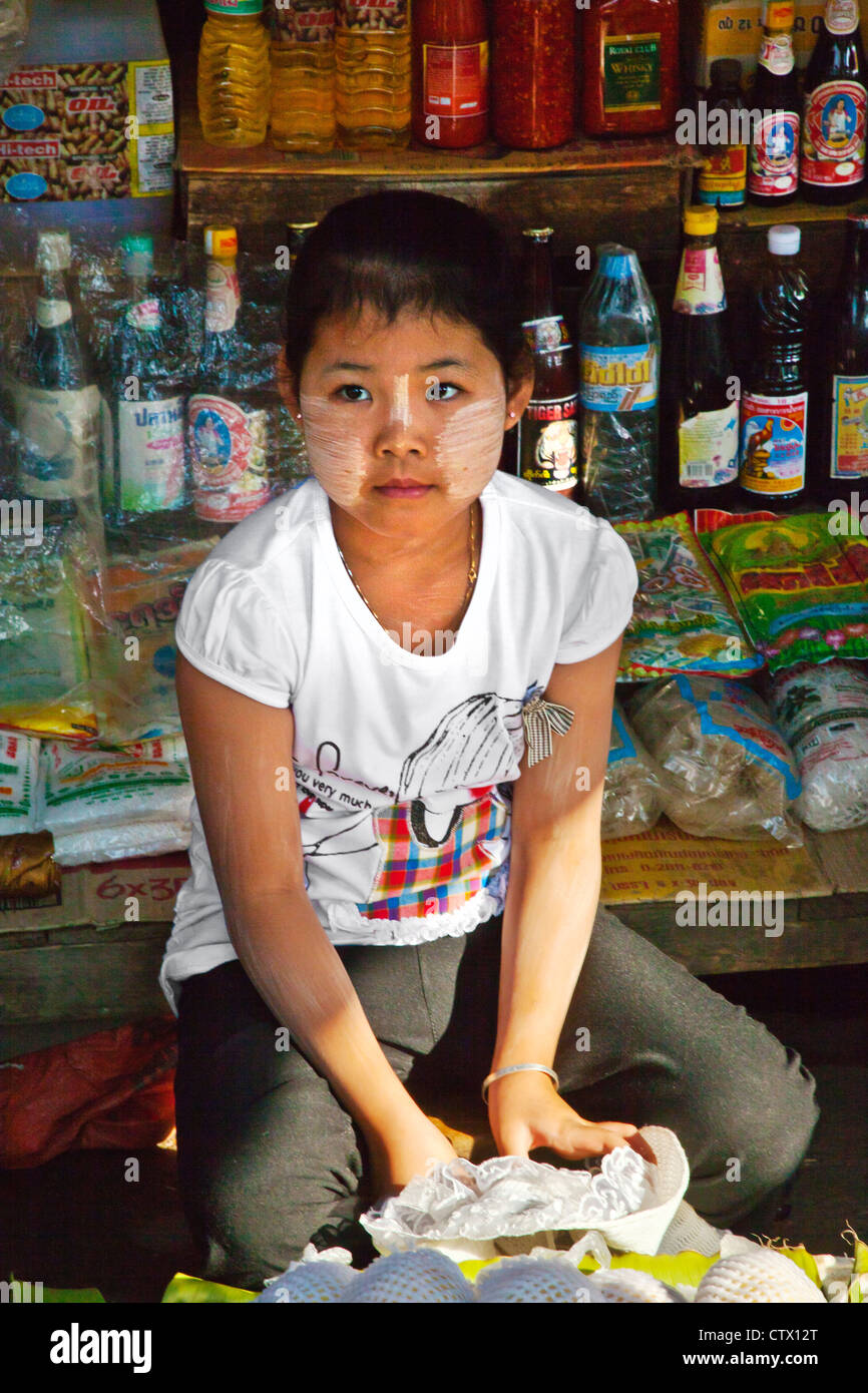 A young girl selling at the CENTRAL MARKET in KENGTUNG also known as ...
