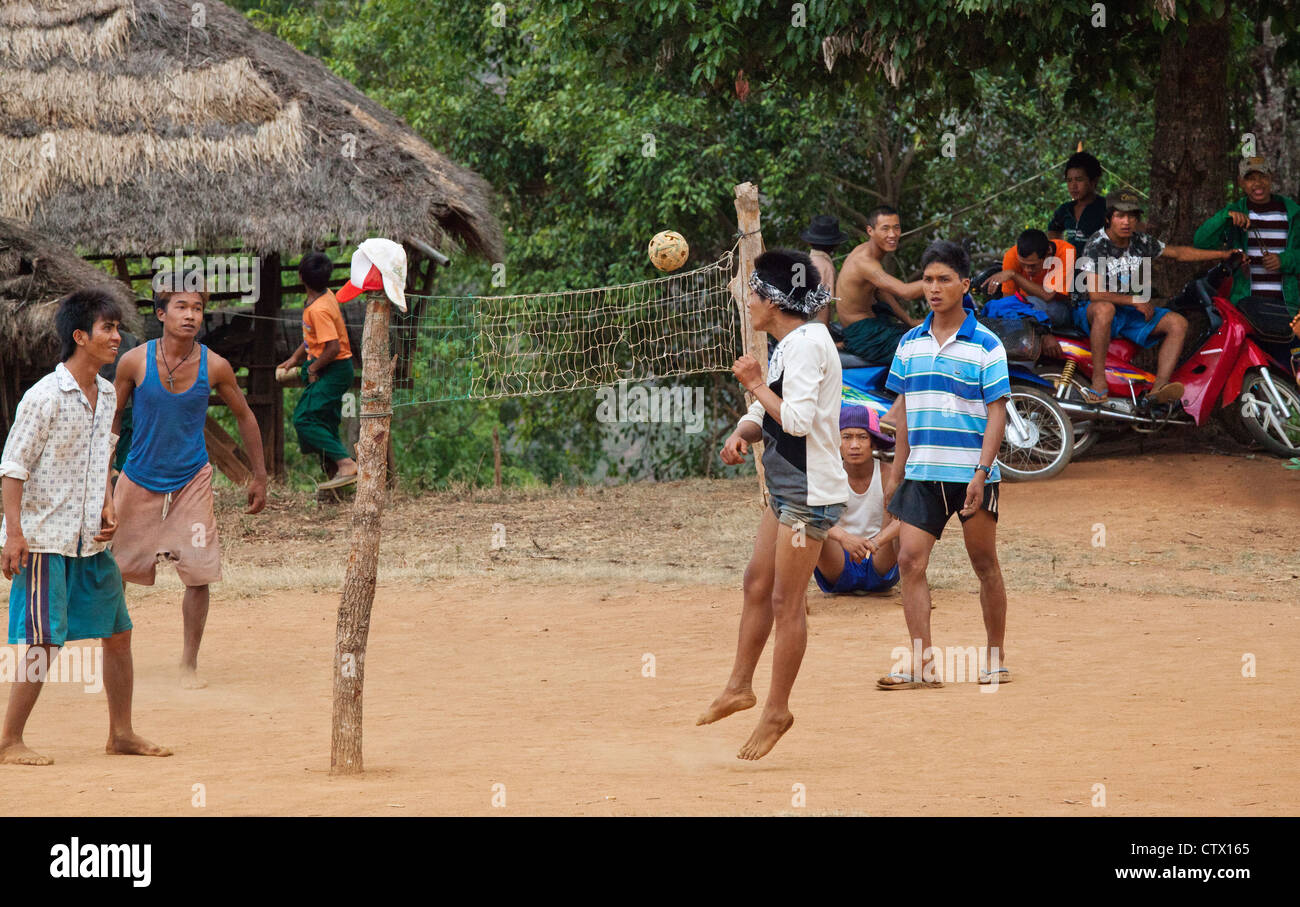 Young AKHA men play a version of volleyball using their heads - village ...