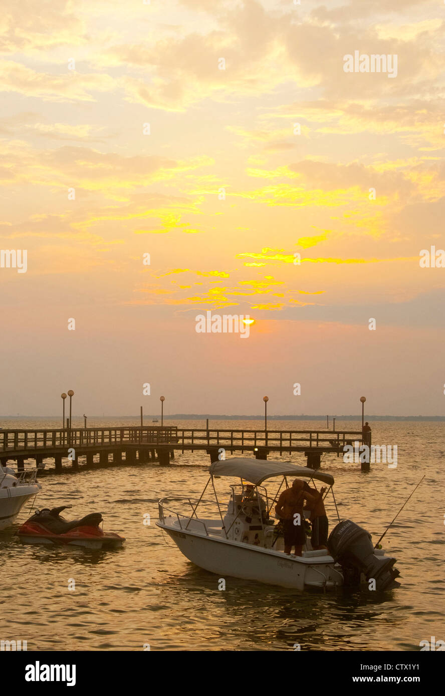 Boats parked for evening by dock Stock Photo - Alamy