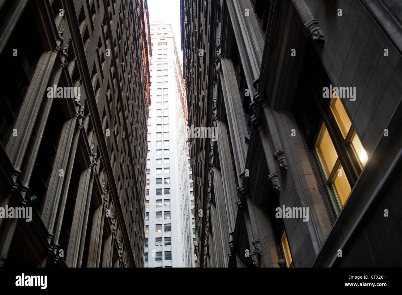 Tall office buildings line the narrow streets of lower Manhattan's ...