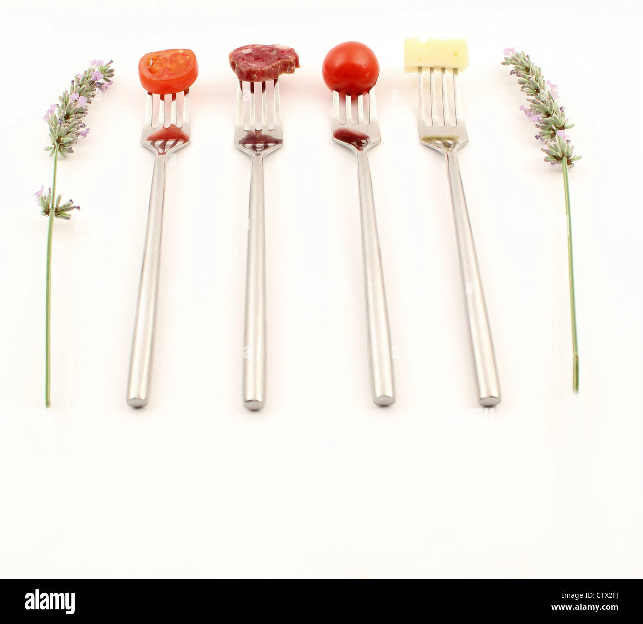 Stick with fork food Stock Photo - Alamy