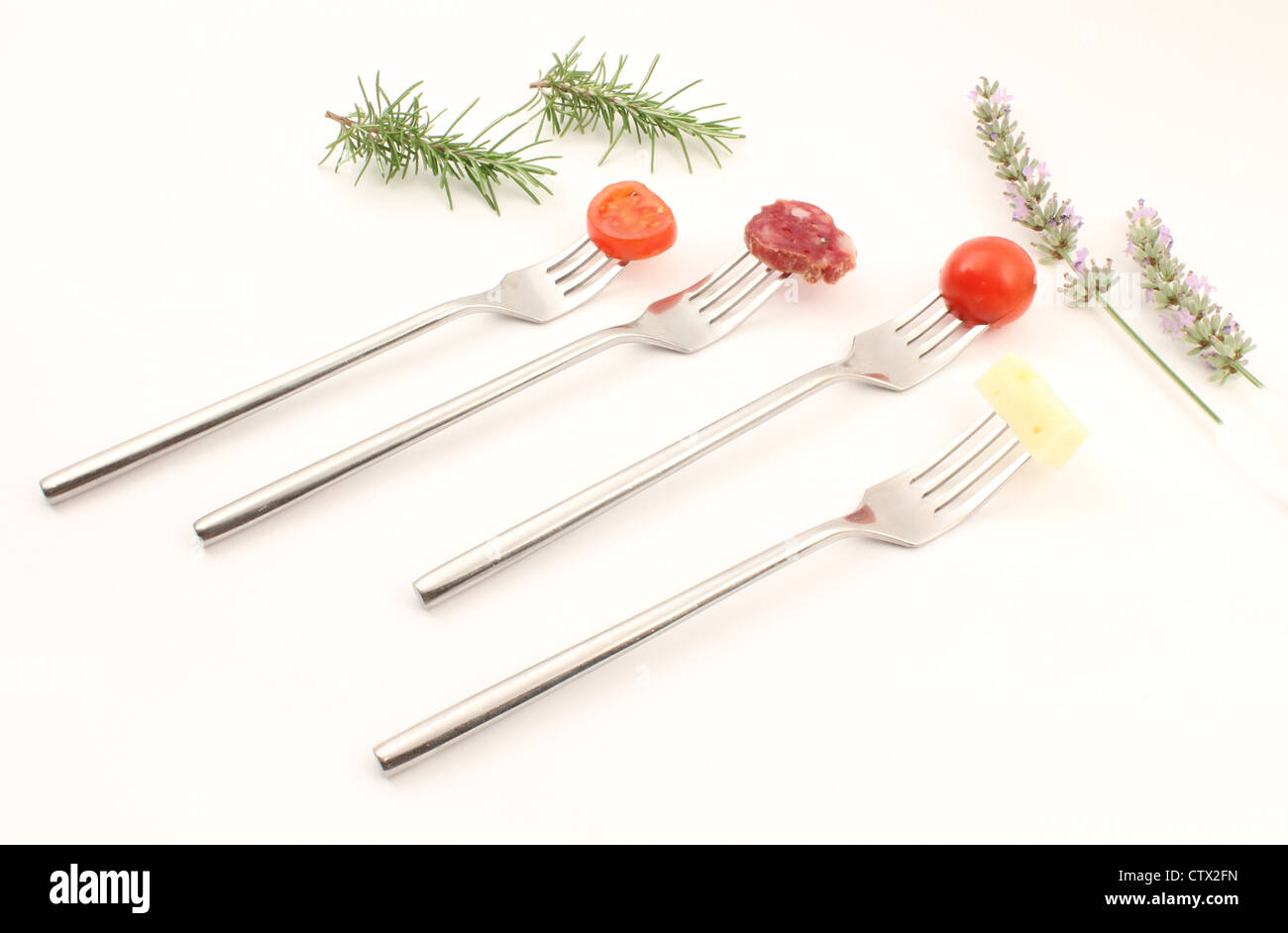 Stick with fork food Stock Photo - Alamy