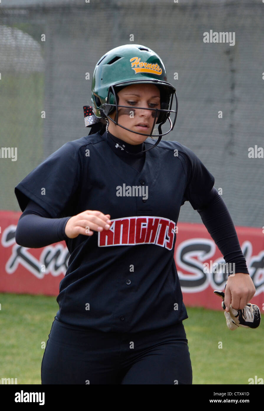 portrait of a softball player running Stock Photo - Alamy