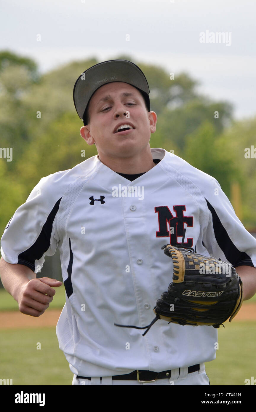 portrait of a teenage baseball player running Stock Photo - Alamy