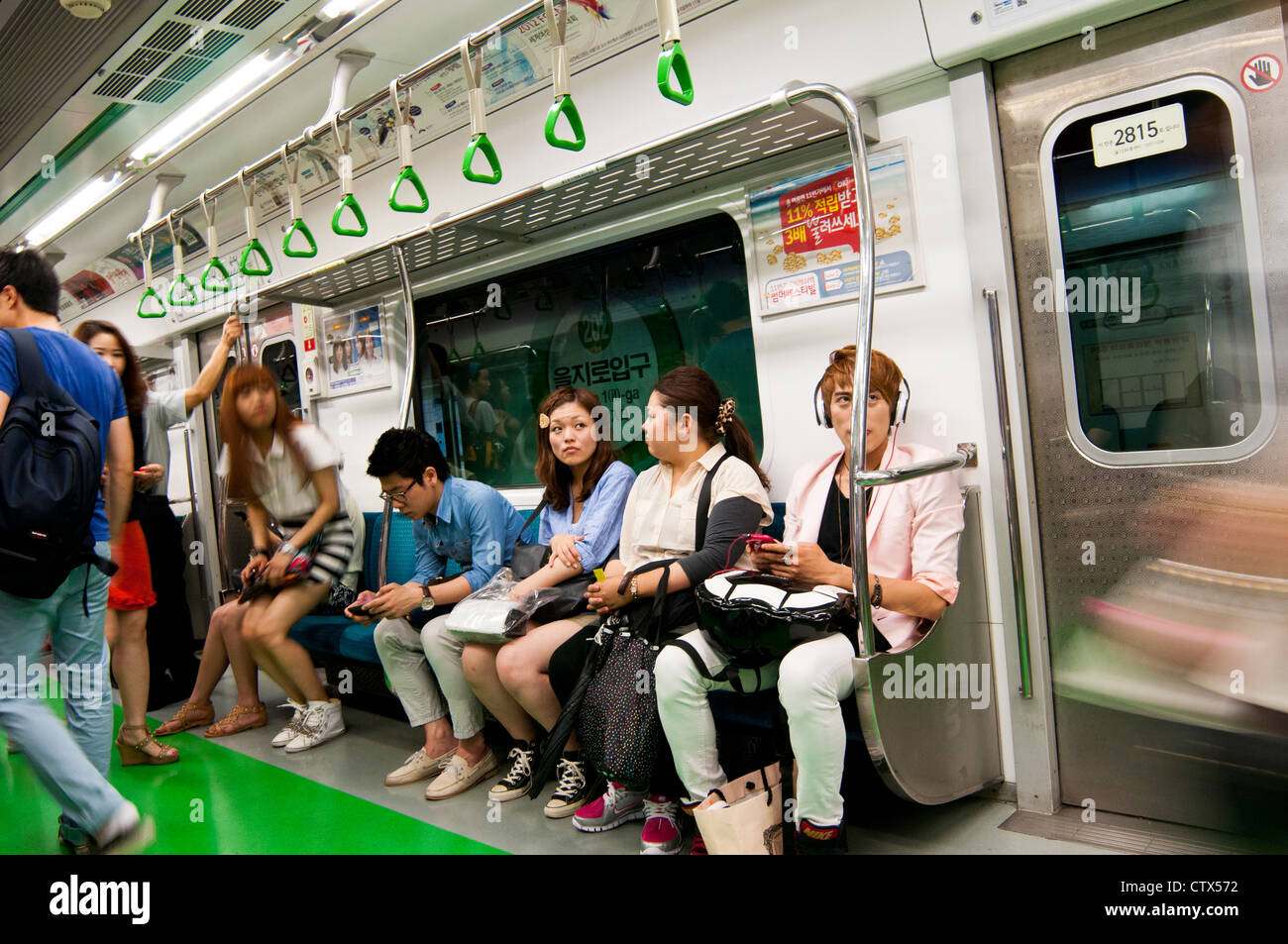 Passengers on subway train, Seoul, Korea Stock Photo - Alamy