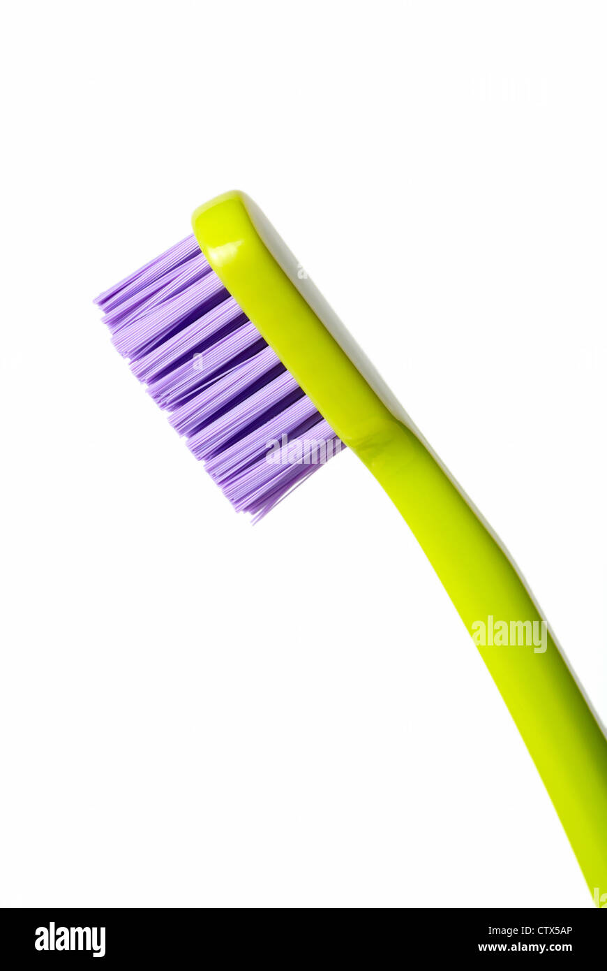 Colored toothbrush diagonally isolated on white background Stock Photo ...