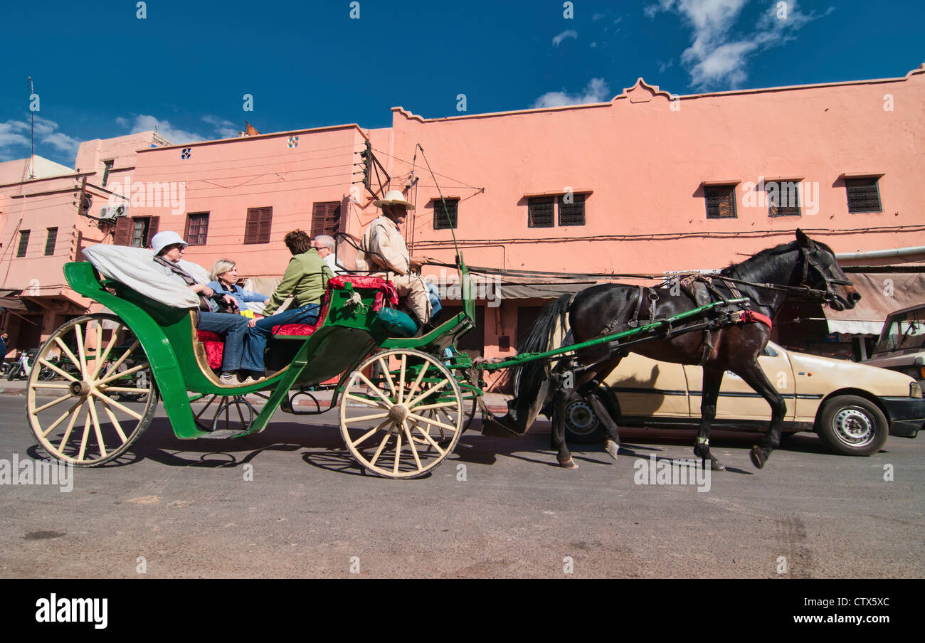 horse carriage in the ancient medina of Marrakech, Morocco Stock Photo ...