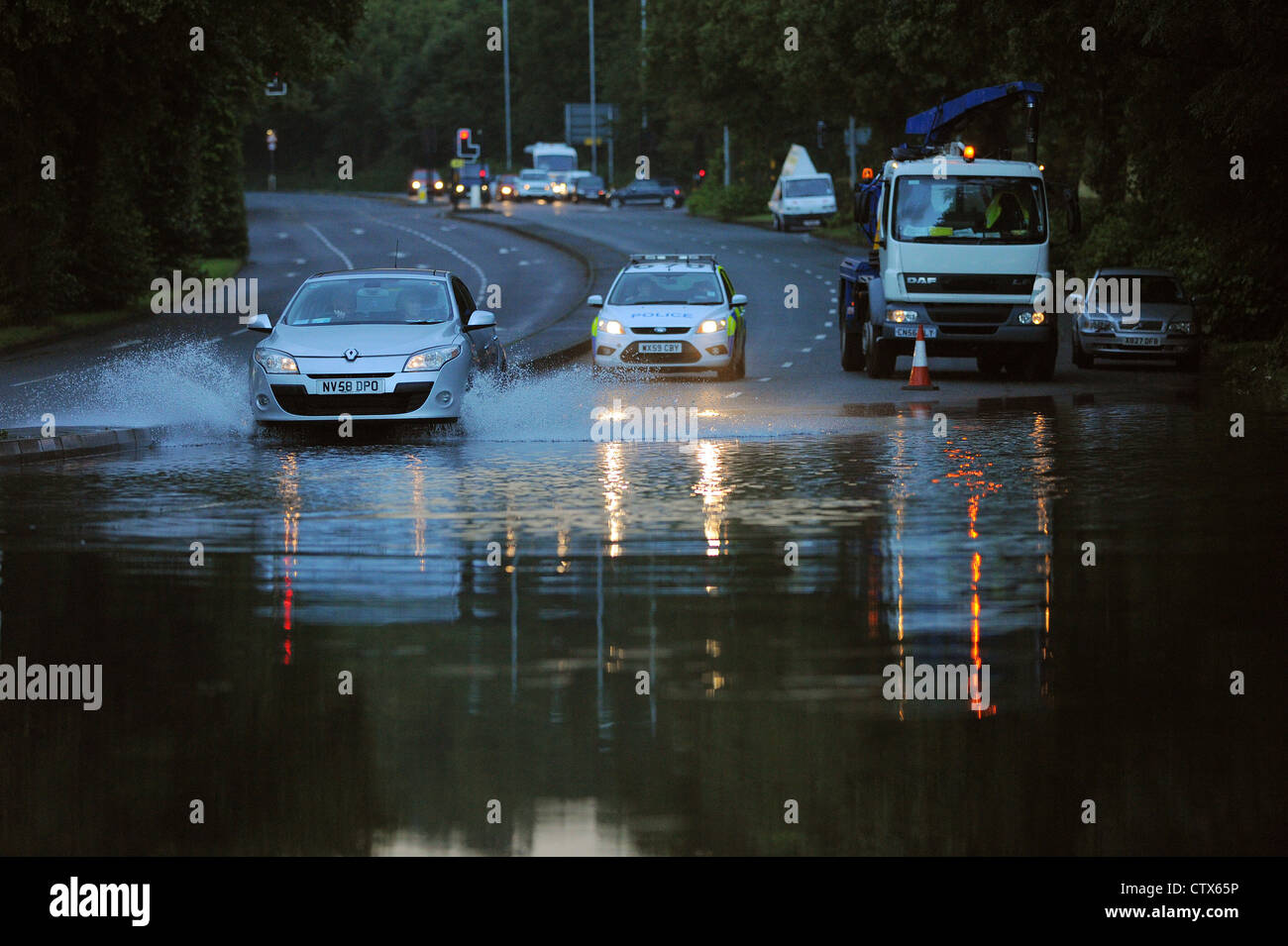 Car drives through flood water hi-res stock photography and images - Alamy