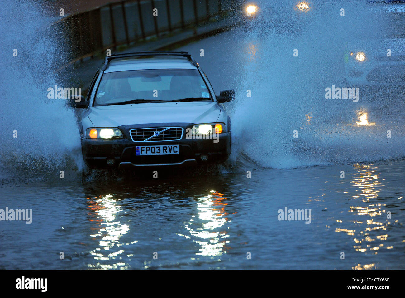 Car drives through flooding hi-res stock photography and images - Alamy