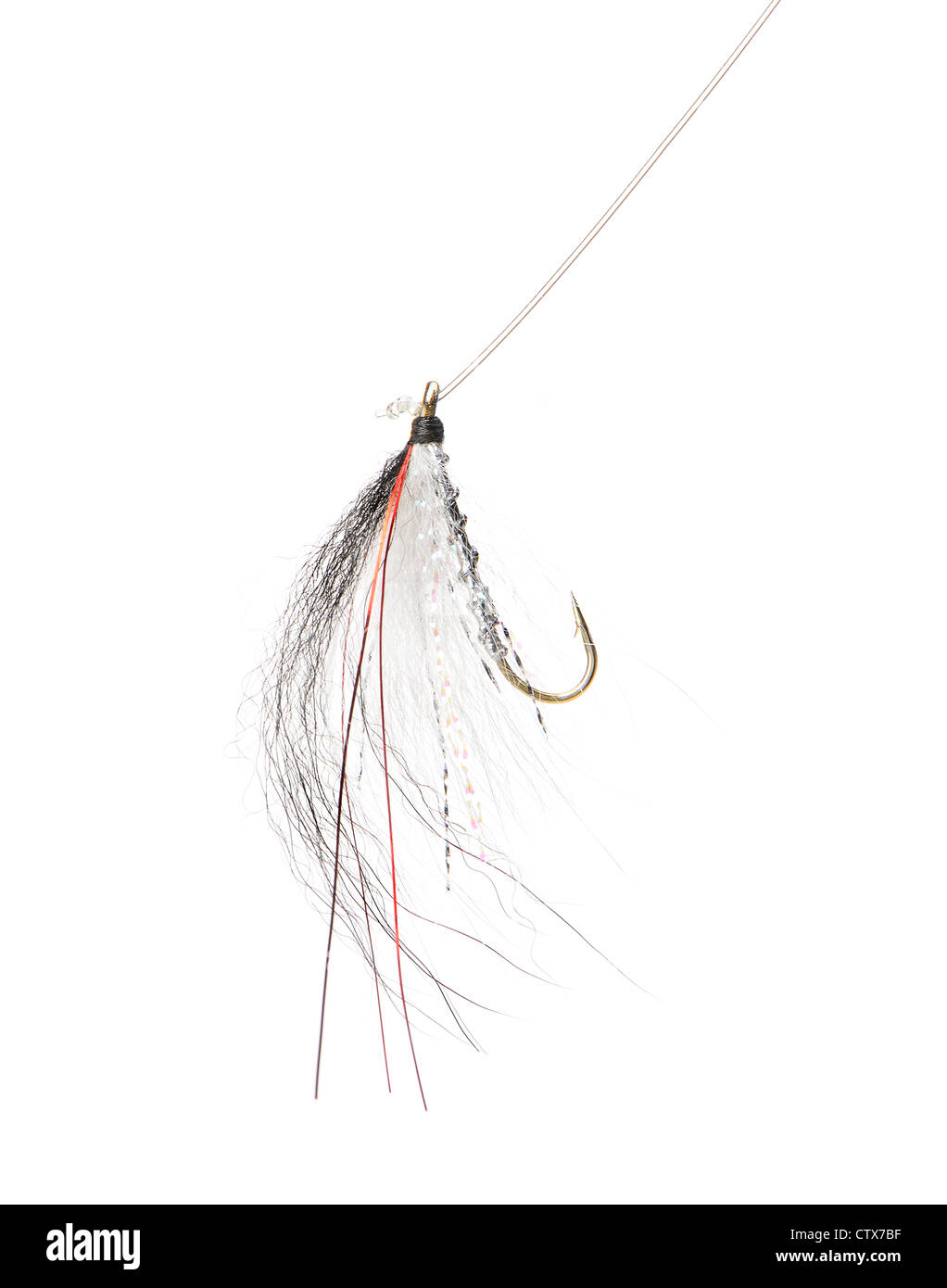 Fly fishing lure isolated on a white background Stock Photo - Alamy