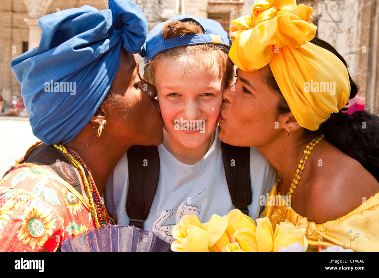 Cuban Girls in Traditional Costume Kissing a Young Tourist, Plaza de La ...