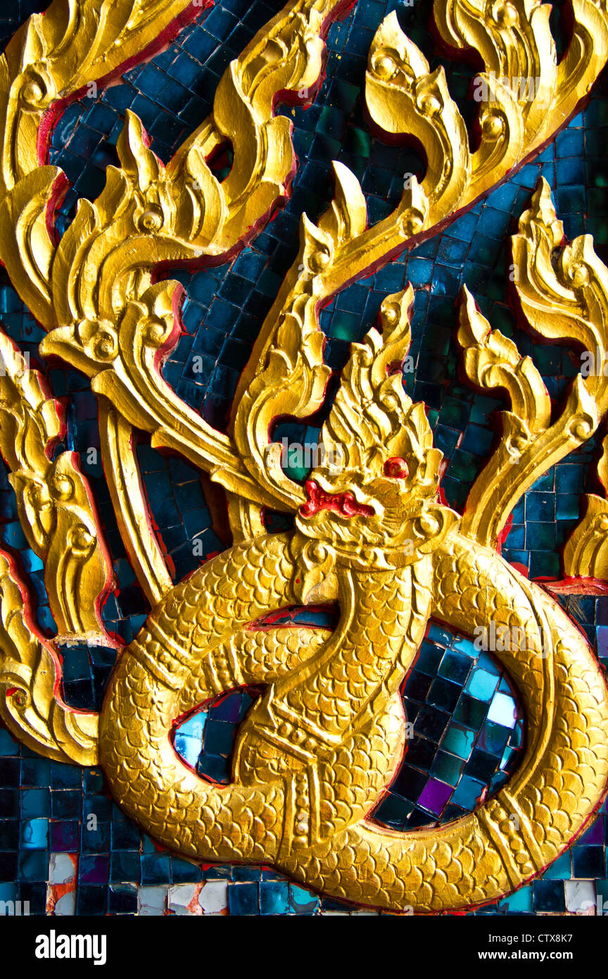 Pattern of golden Naga on wall at Wat Pho,Bangkok,Thailand Stock Photo ...