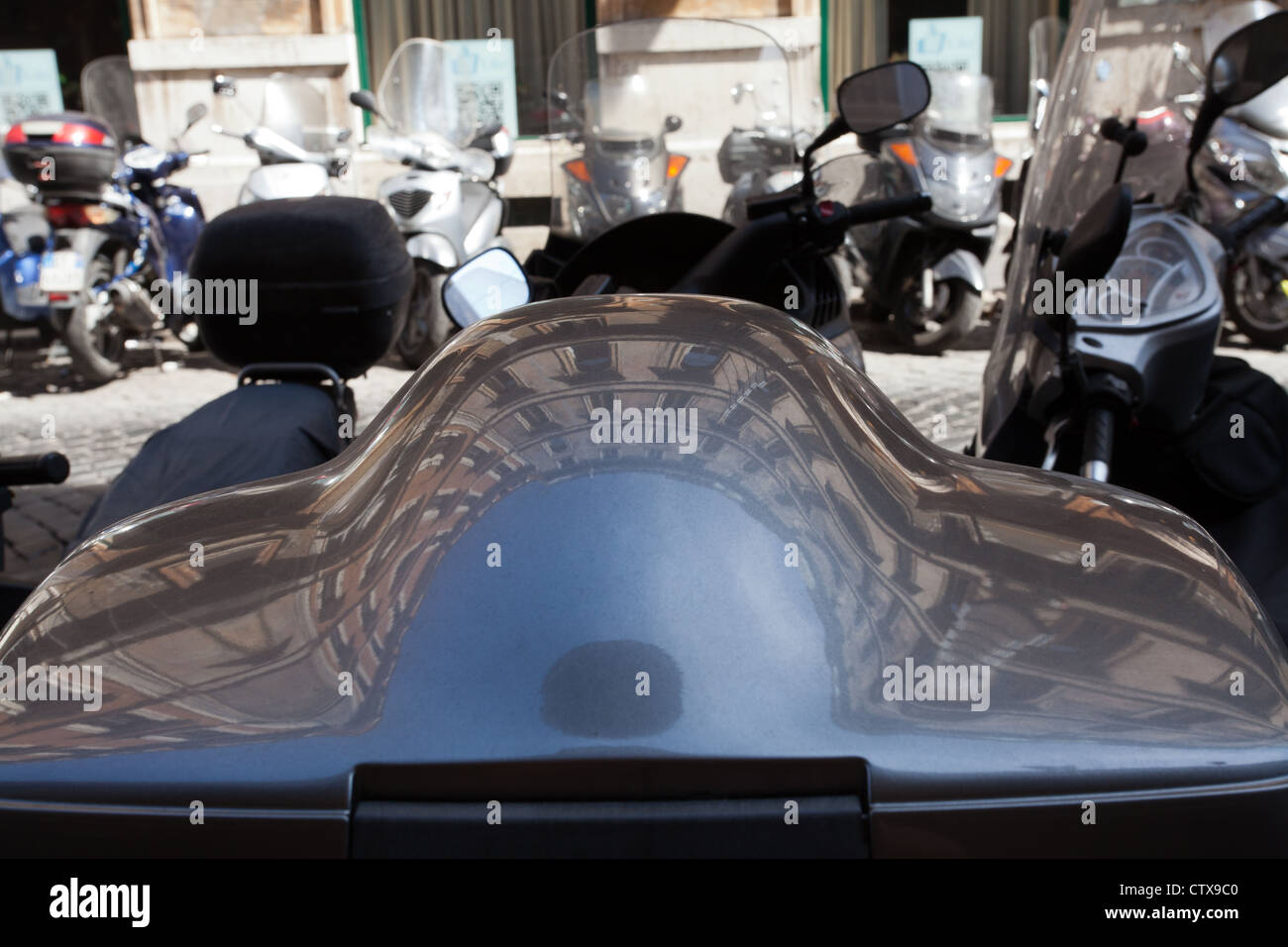 Motorcycles, reflection, Rome, Italy Stock Photo - Alamy