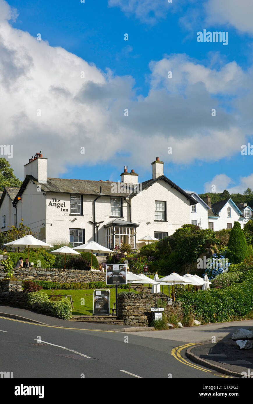 People sitting in the beer garden of the Angel Inn, Bowness, Lake ...