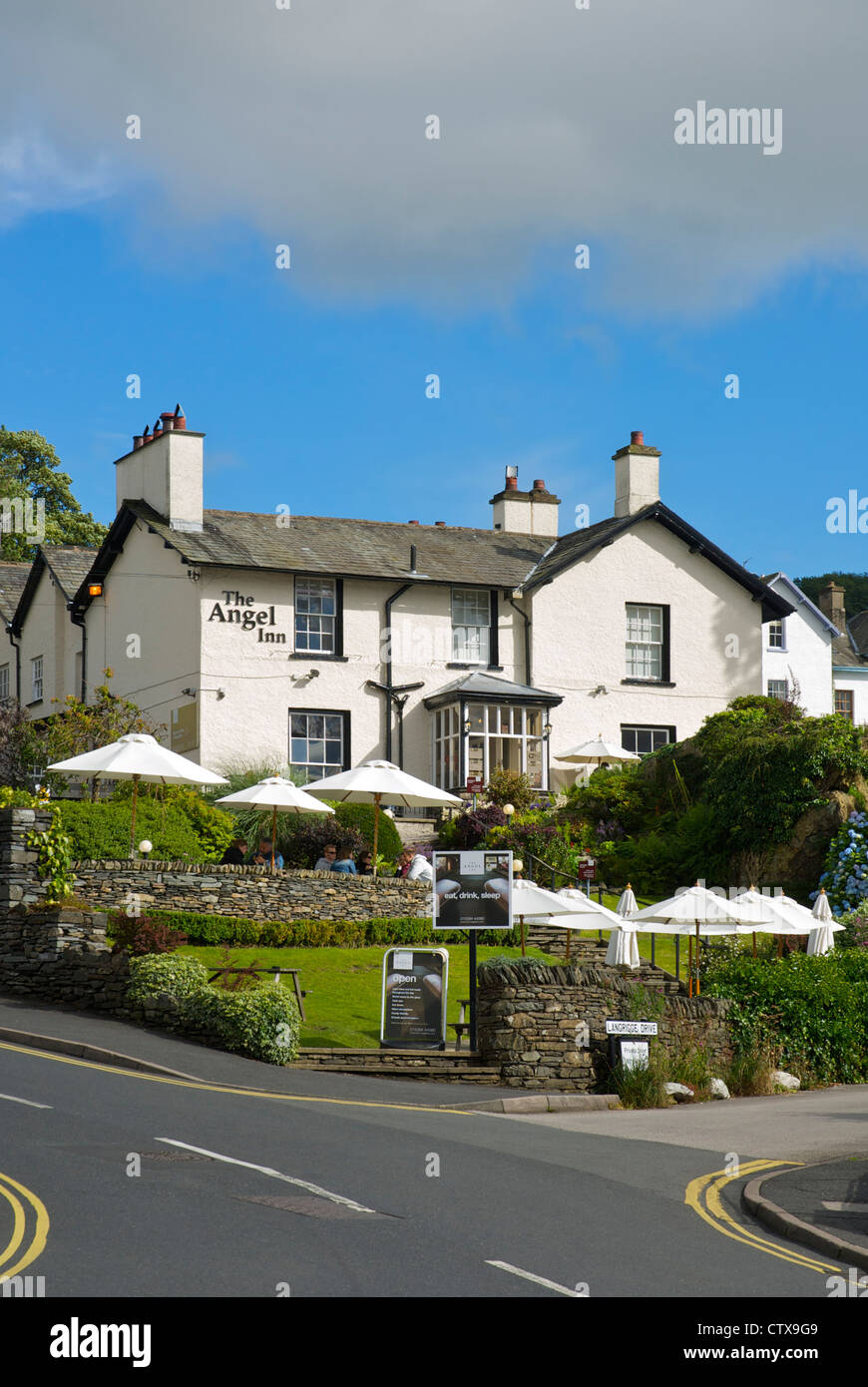 People sitting in the beer garden of the Angel Inn, Bowness, Lake ...