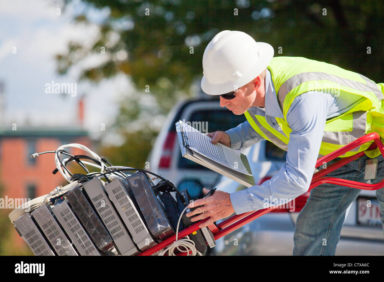 Data cable installer hi-res stock photography and images - Alamy