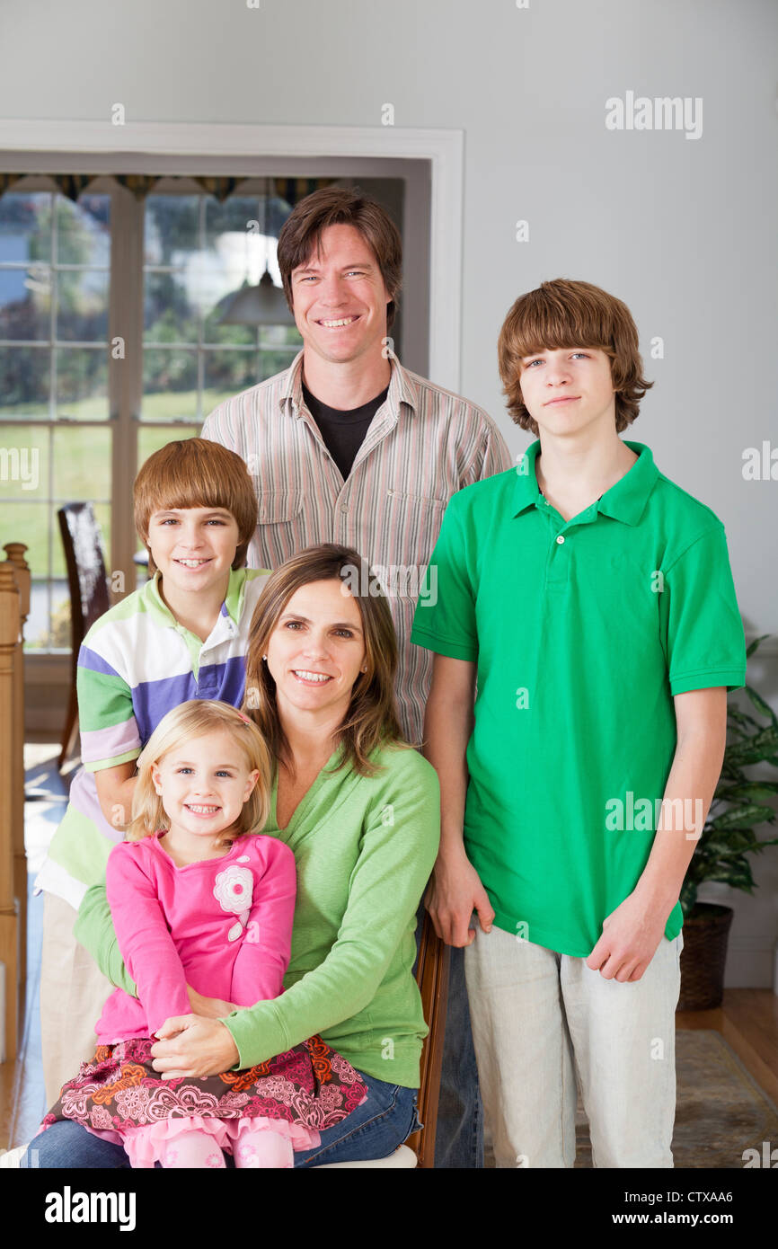 Portrait of a happy couple with their two sons and a daughter Stock ...