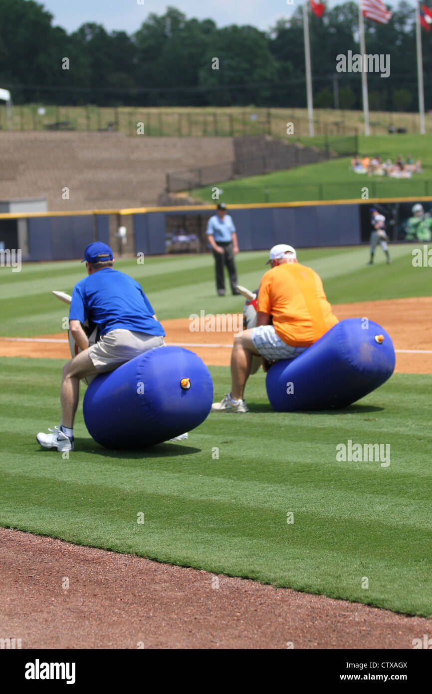 Fans play game between innings at minor league baseball game Stock ...