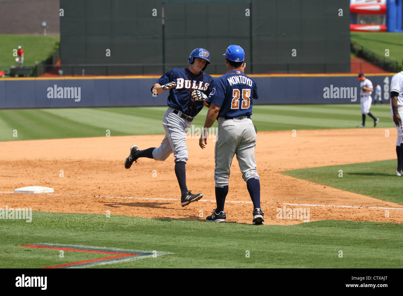 Durham Bulls batter Rich Thompson rounds third after homerun Stock ...
