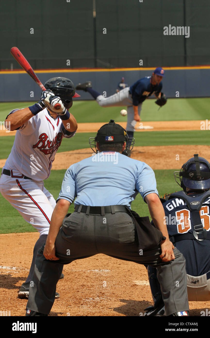 Umpire Gerard Ascani looks on as Durham Bulls pitcher Josh Lueke ...