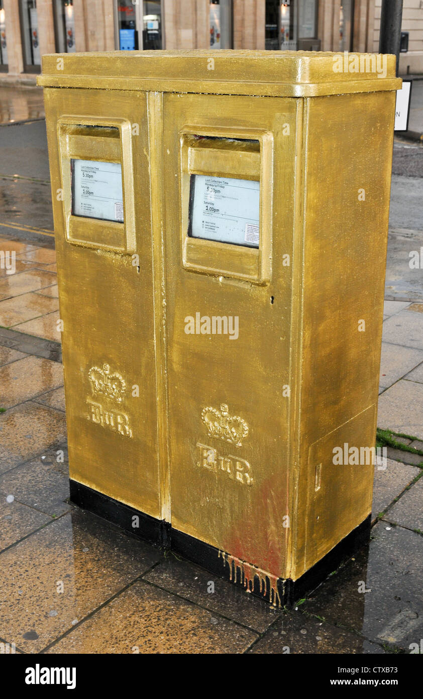 Royal Mail hastily gold painted post-box on Upper High Street ...