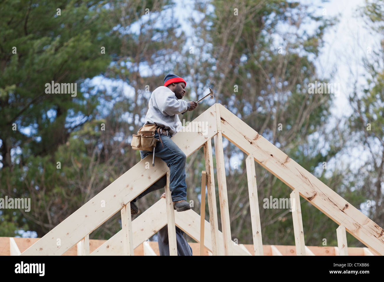 Carpenter on roof framework hi-res stock photography and images - Alamy