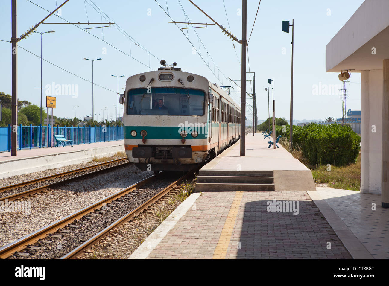 Intercity electric speed train arriving in airport station from ...