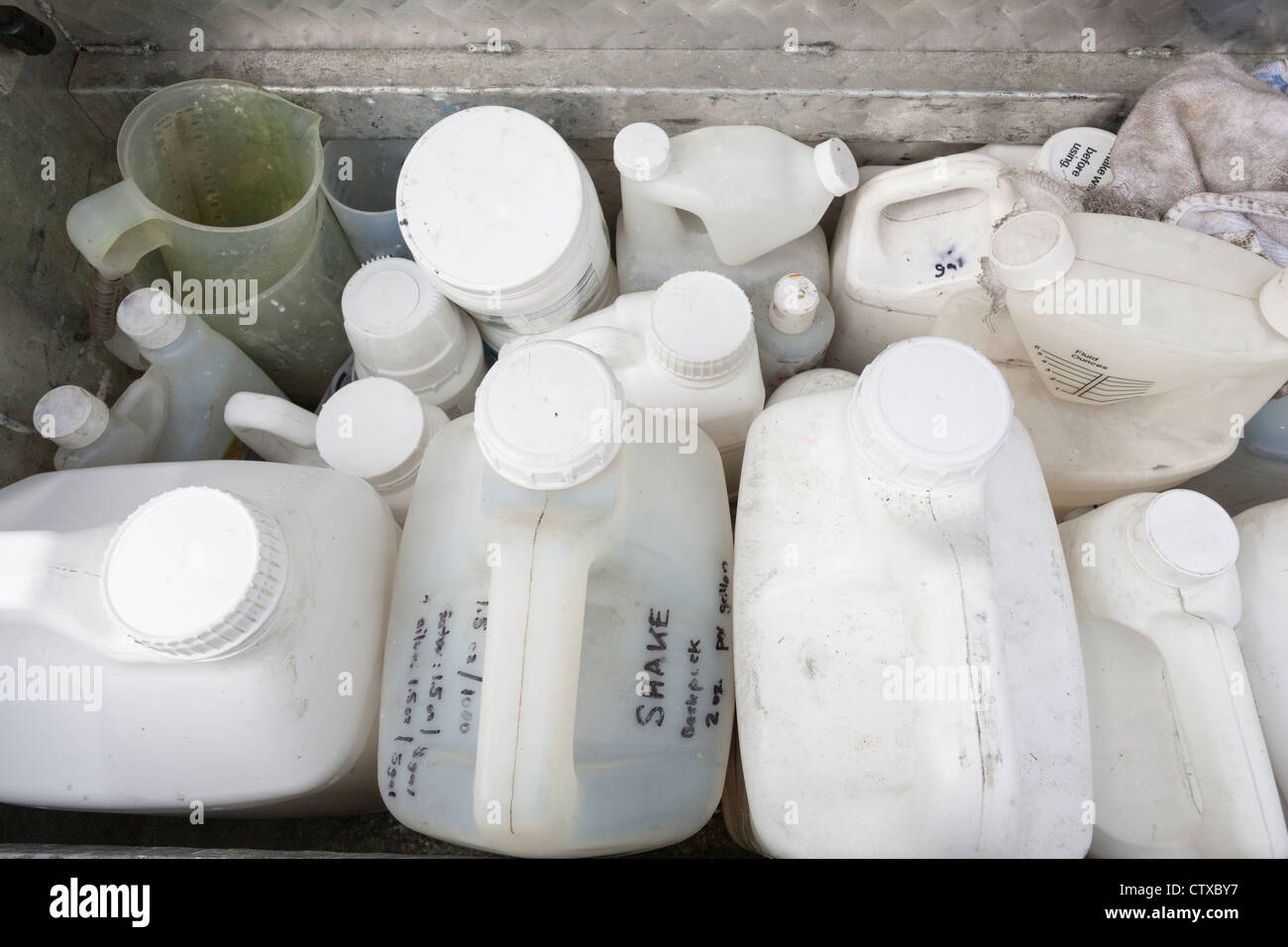Chemical containers for use in pest control spraying Stock Photo - Alamy