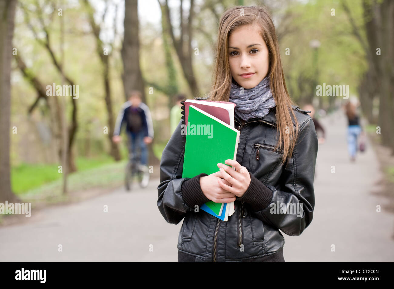 Portrait of a cool fashionable young student girl outdoors Stock Photo ...