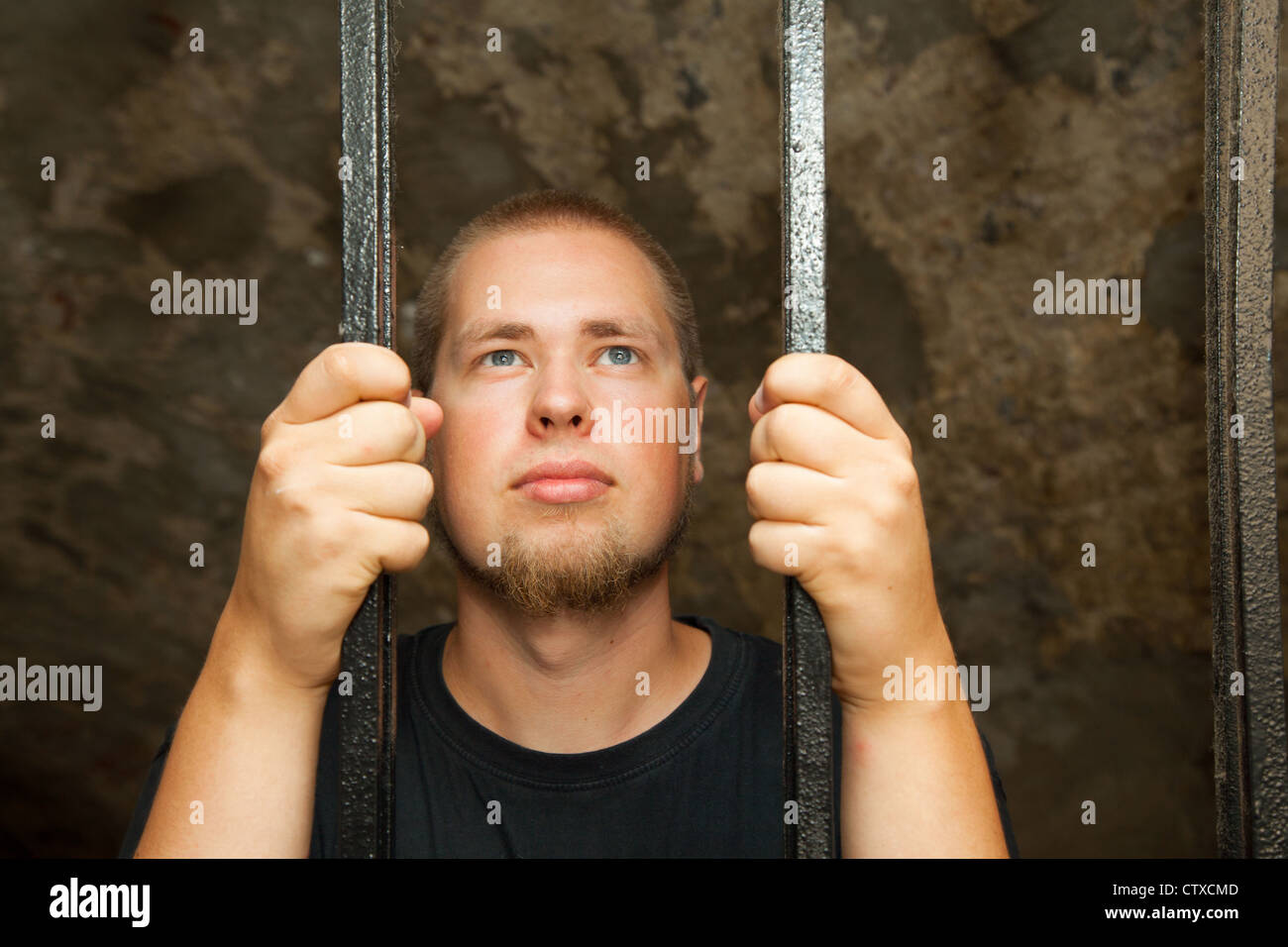 Man behind bars hi-res stock photography and images - Alamy
