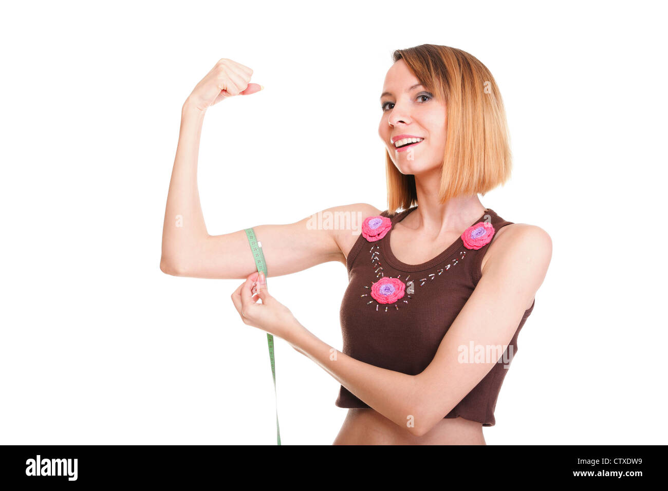 Beautiful young caucasian woman measuring her body with tape, isolated ...