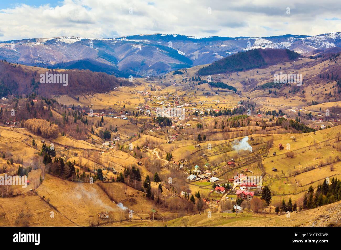 Landscape with village in a valley between mountains Stock Photo - Alamy