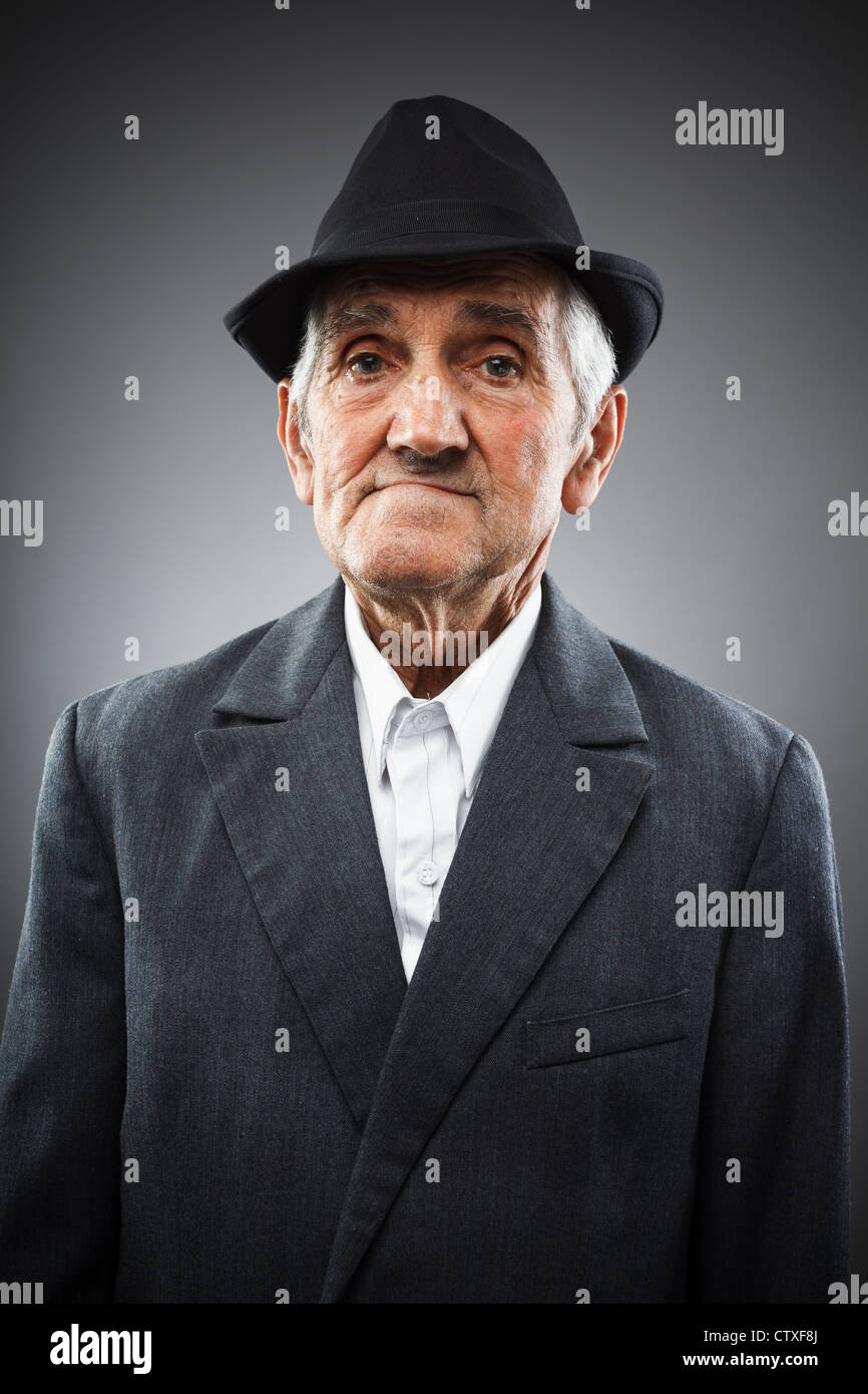Studio portrait of an expressive old man Stock Photo - Alamy