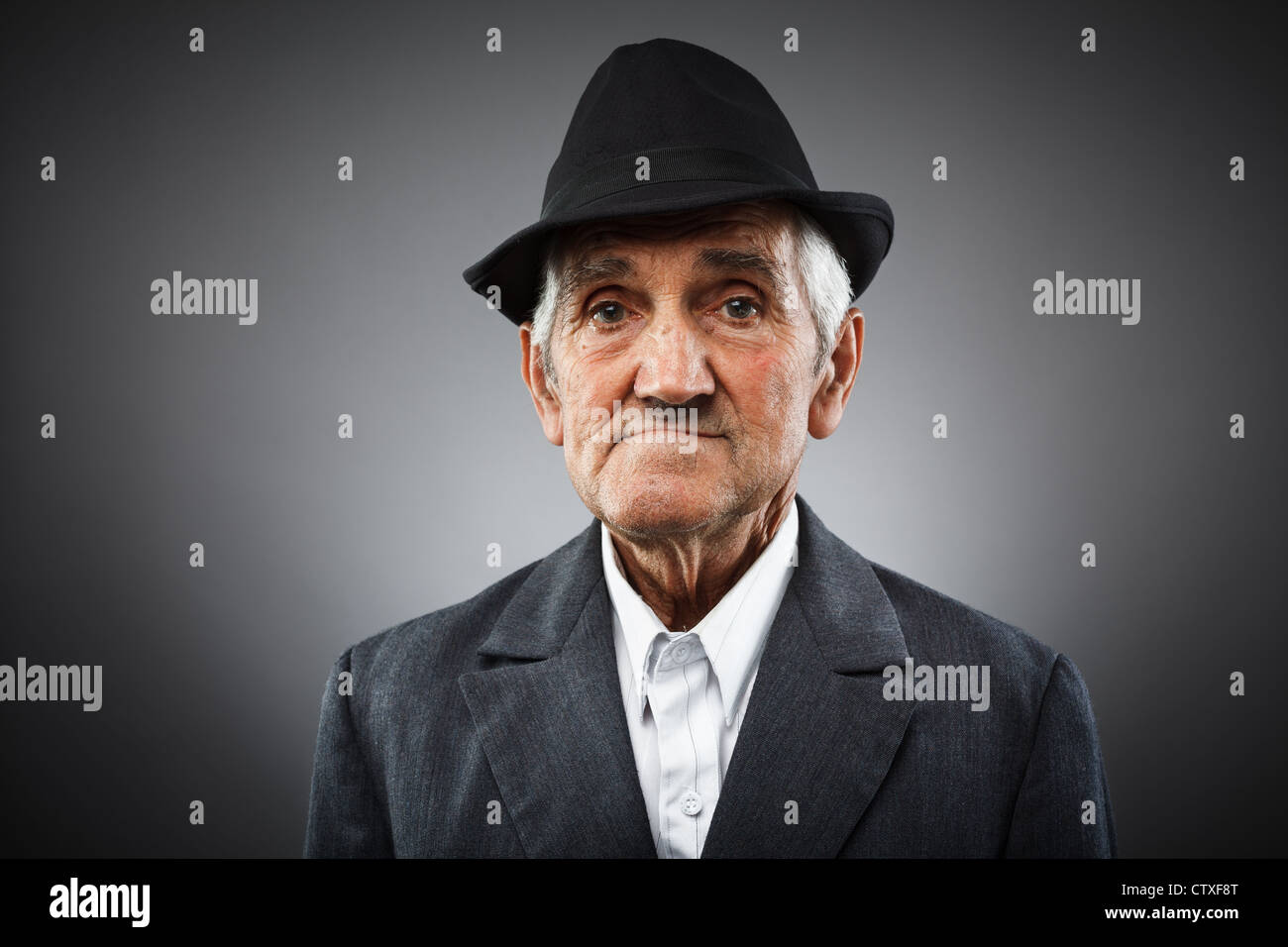 Studio portrait of an expressive old man Stock Photo - Alamy