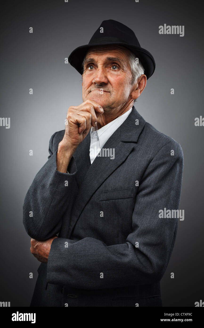 Studio portrait of an expressive old man Stock Photo - Alamy