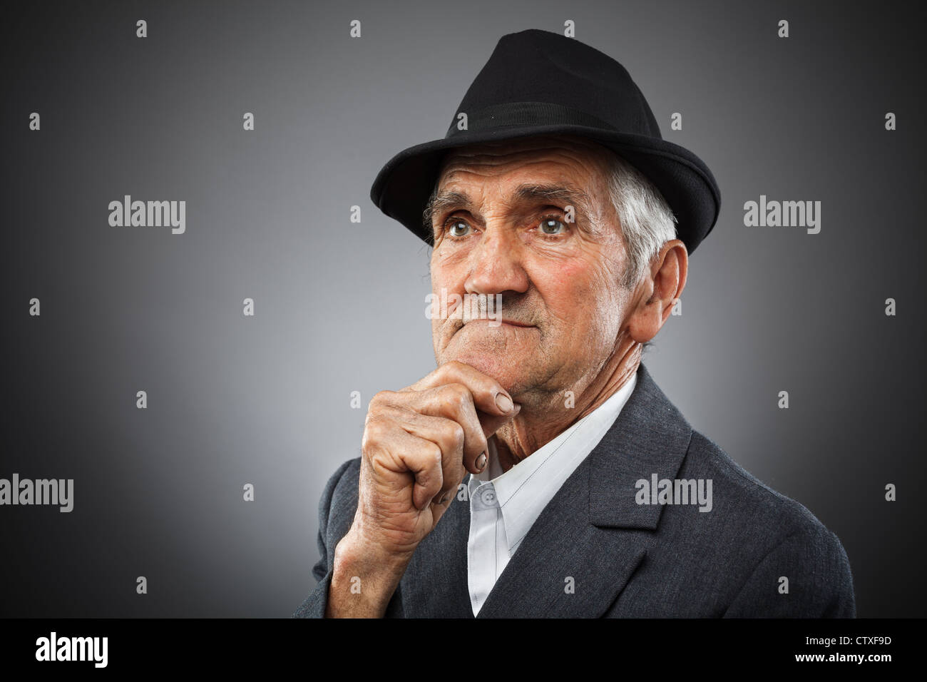 Studio portrait of an expressive old man Stock Photo - Alamy