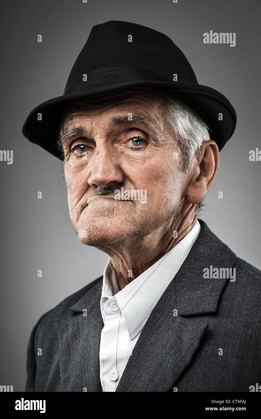 Studio portrait of an expressive old man Stock Photo - Alamy