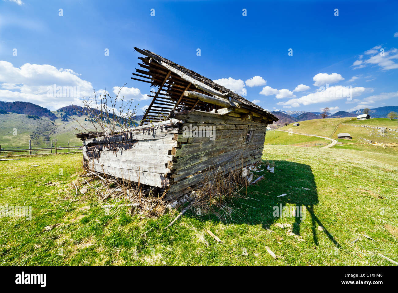 Landscape with an abandoned wooden shack Stock Photo - Alamy