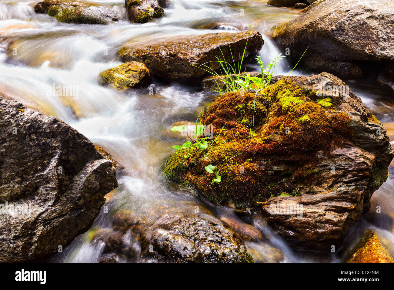 Landscape with river flowing through rocks Stock Photo - Alamy
