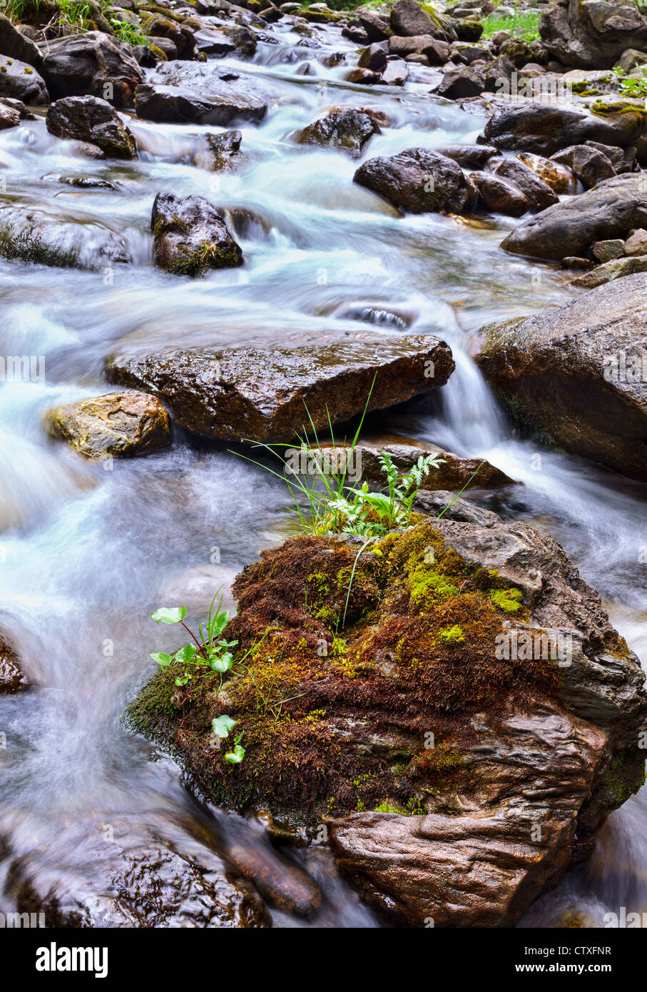 Landscape with river flowing through rocks Stock Photo - Alamy