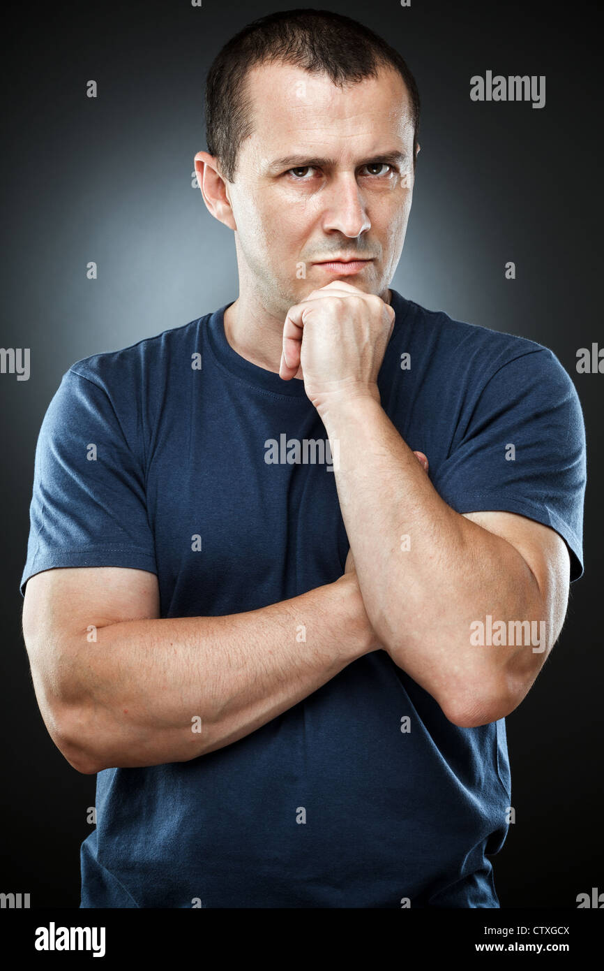 Tough muscular man arms crossed hi-res stock photography and images - Alamy
