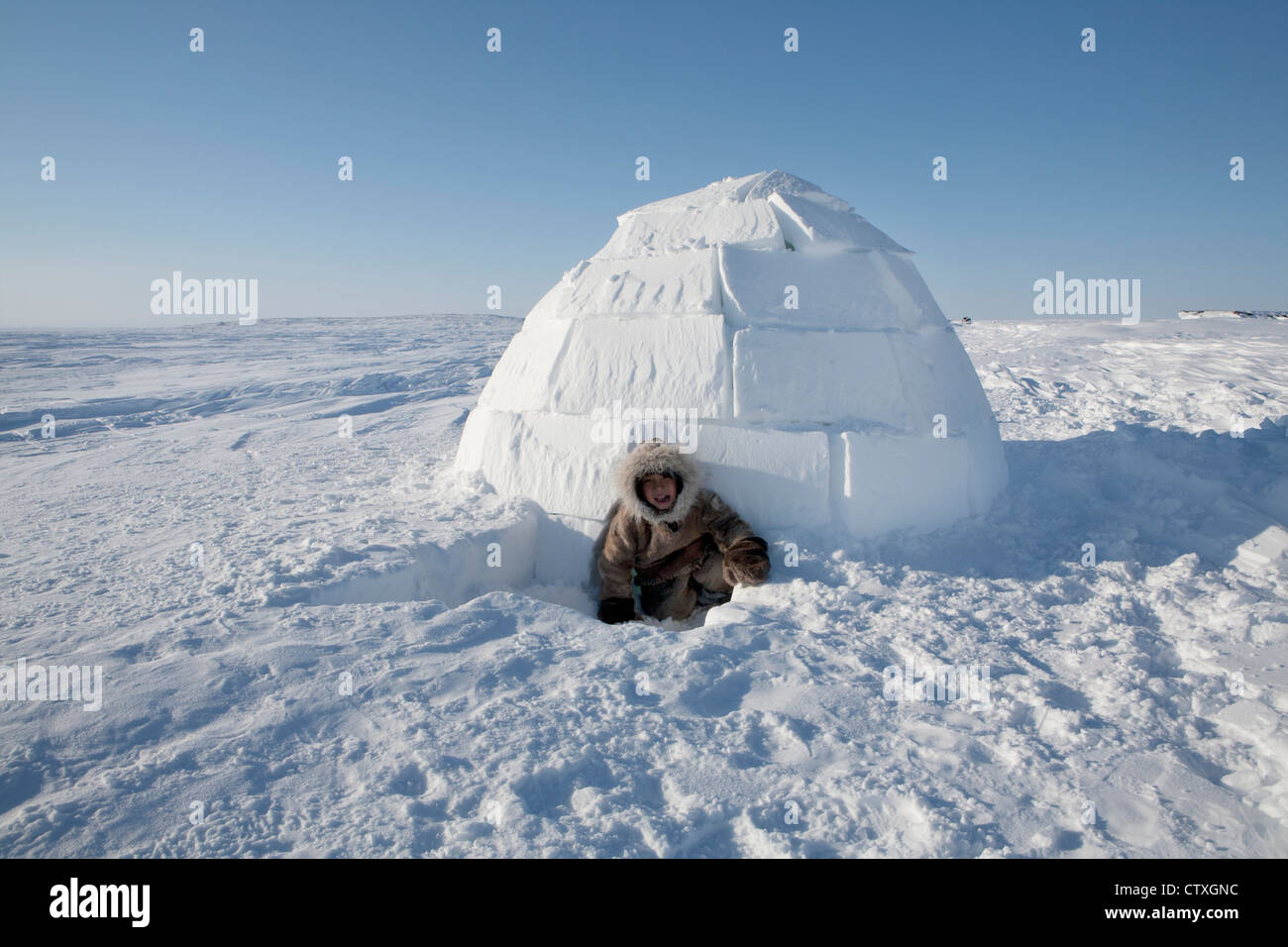 Inuit boy on the North Pole Stock Photo - Alamy