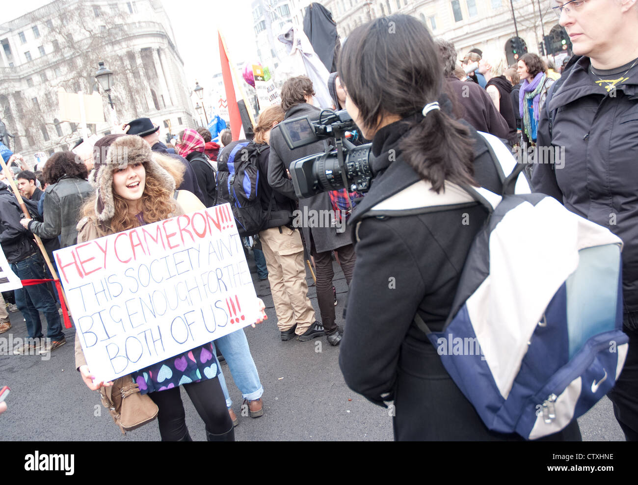 young girl holds a placard at the TUC rally london Stock Photo - Alamy